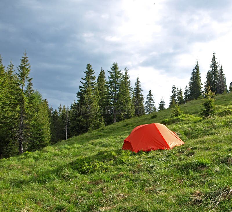 Red tent set in wilderness stock image. Image of meadow - 22674663