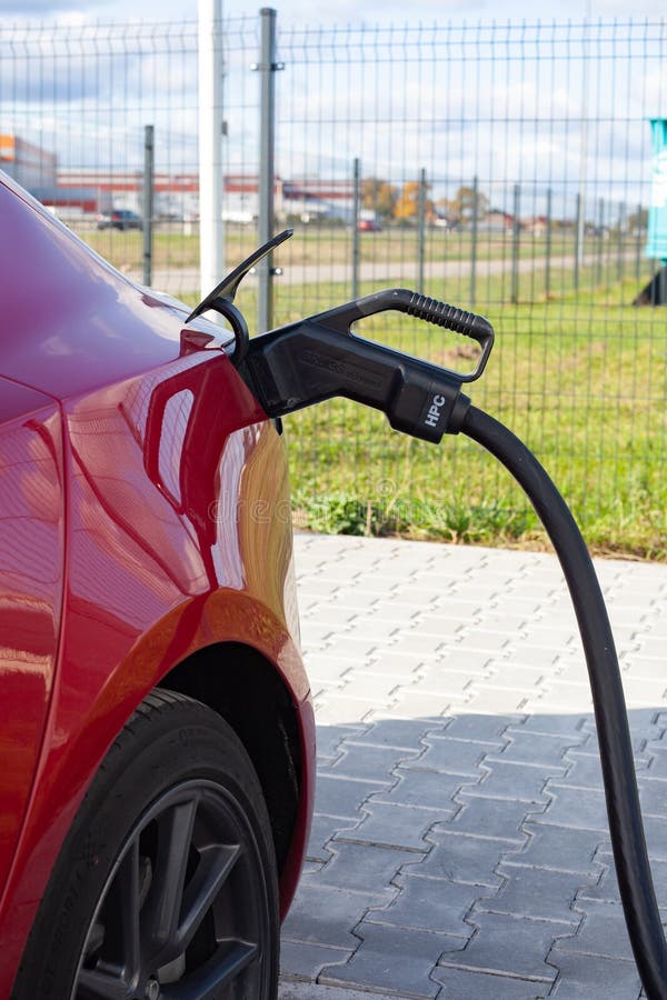Red Tesla Model 3 on Charging Editorial Stock Photo - Image of ...