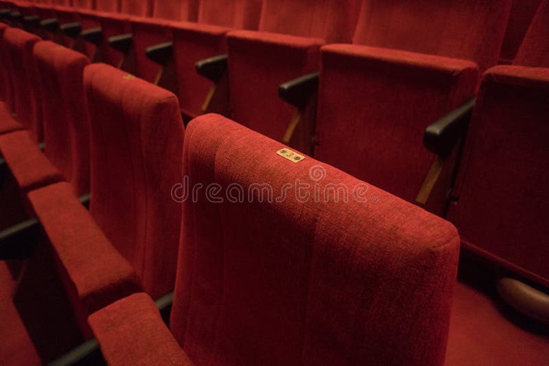Red theater chairs stock photo. Image of indoor, show - 99886802