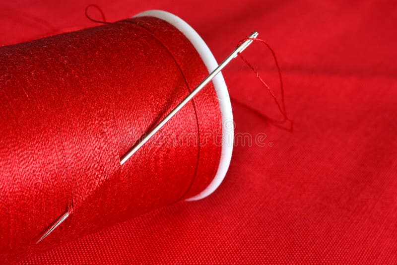 Red Thread and Sewing Needle Stock Photo - Image of design, color ...