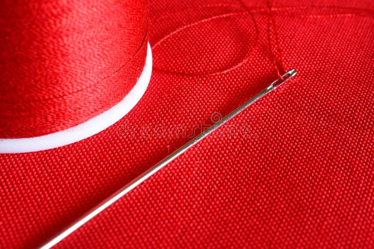 Red Thread and Sewing Needle Stock Photo - Image of close, silk: 142807390