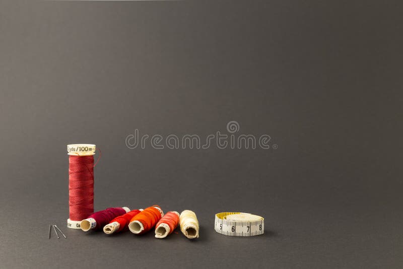 Red Thread Spools with Measuring Tape Stock Image - Image of craft ...