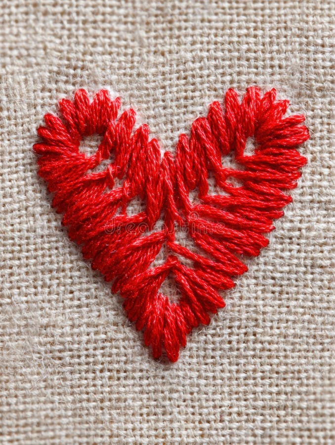 Red Thread Stitched into a Heart Shape on a Textured Linen Background ...