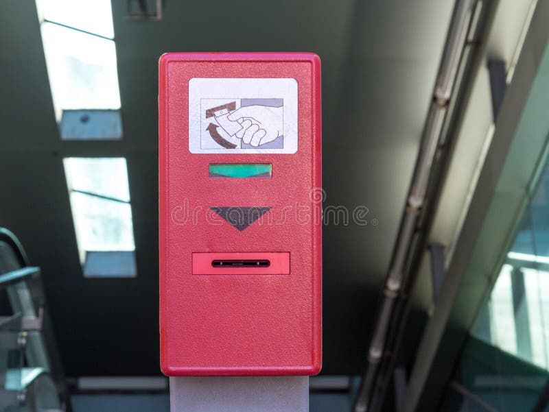 A Red Ticket Validation Machine for the Underground Stock Photo - Image ...