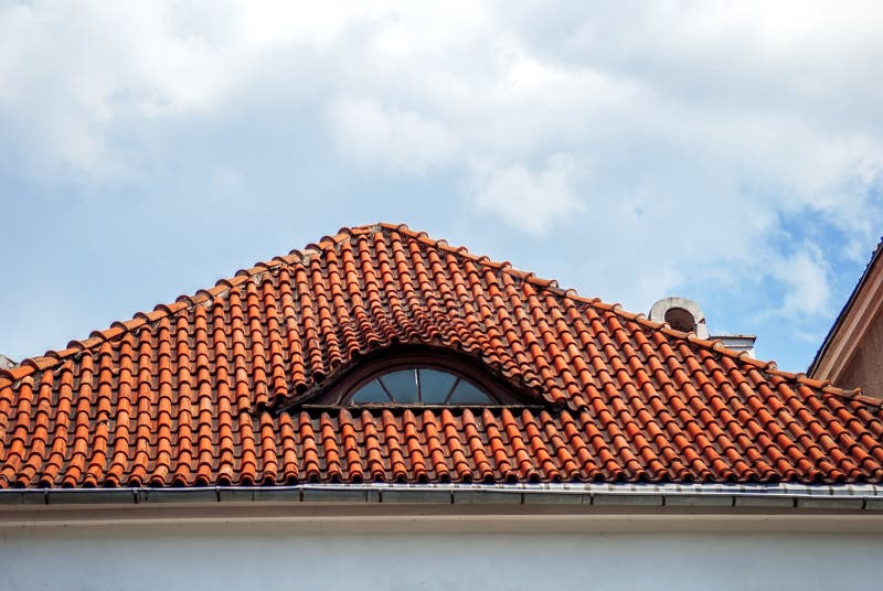 Red Tile Roof with a Window Stock Photo - Image of building ...