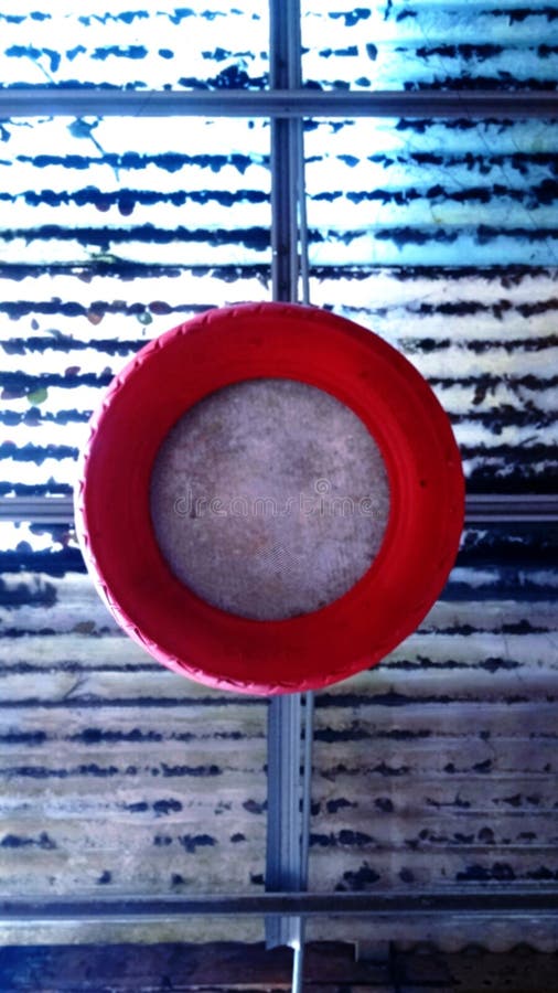 Red tire on roof stock image. Image of organ, hand, orange - 262405419