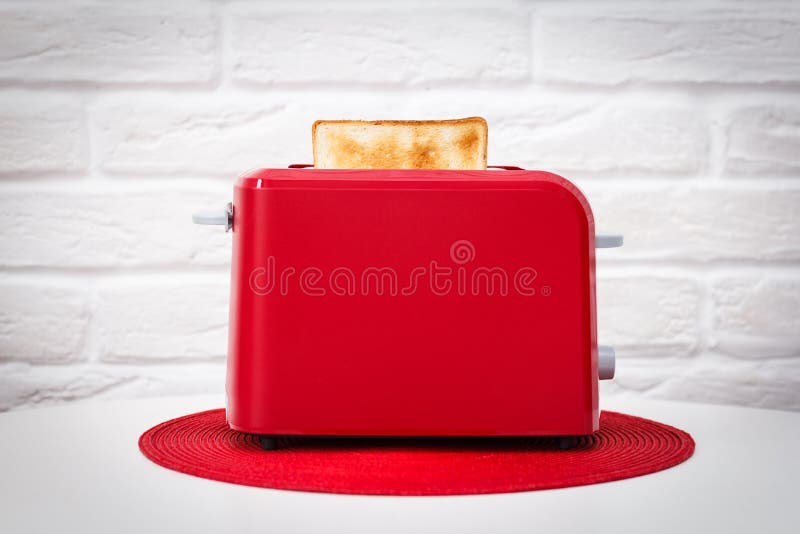 Red Toaster with Toasted Bread for Breakfast Inside. Stock Image ...