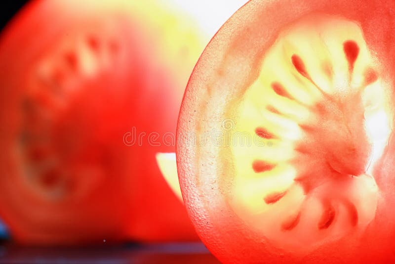 Red Tomato Cut in Half with the Texture of Seeds Stock Photo - Image of ...