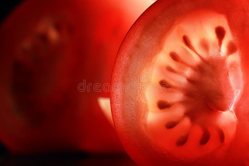 Red Tomato Cut in Half with the Texture of Seeds Stock Photo - Image of ...