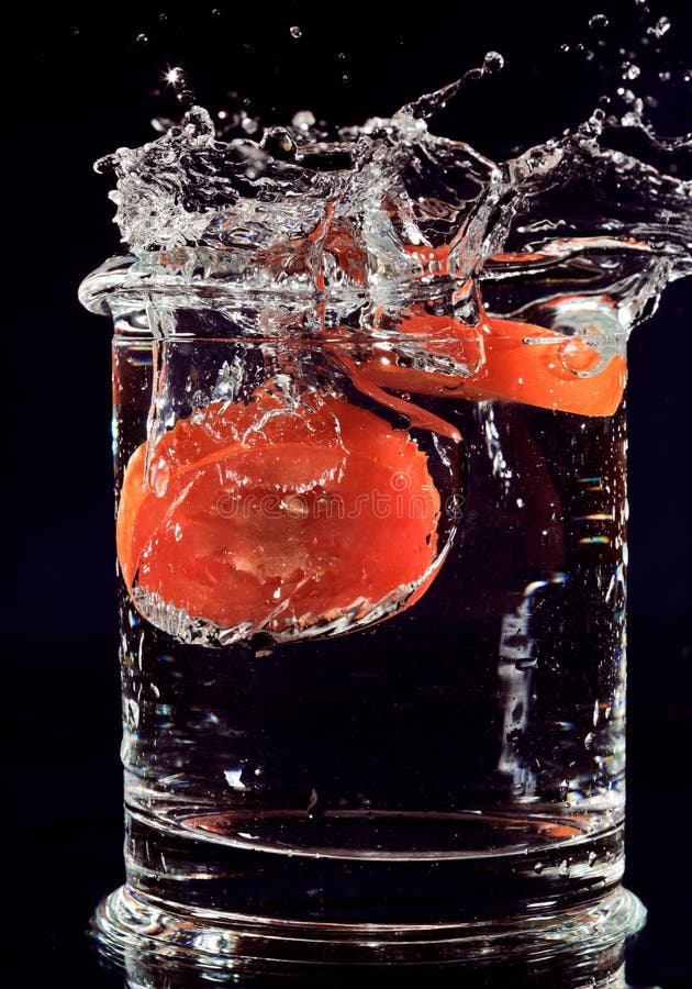 Red Tomato Falling Down in Water Glass Stock Image - Image of clear ...