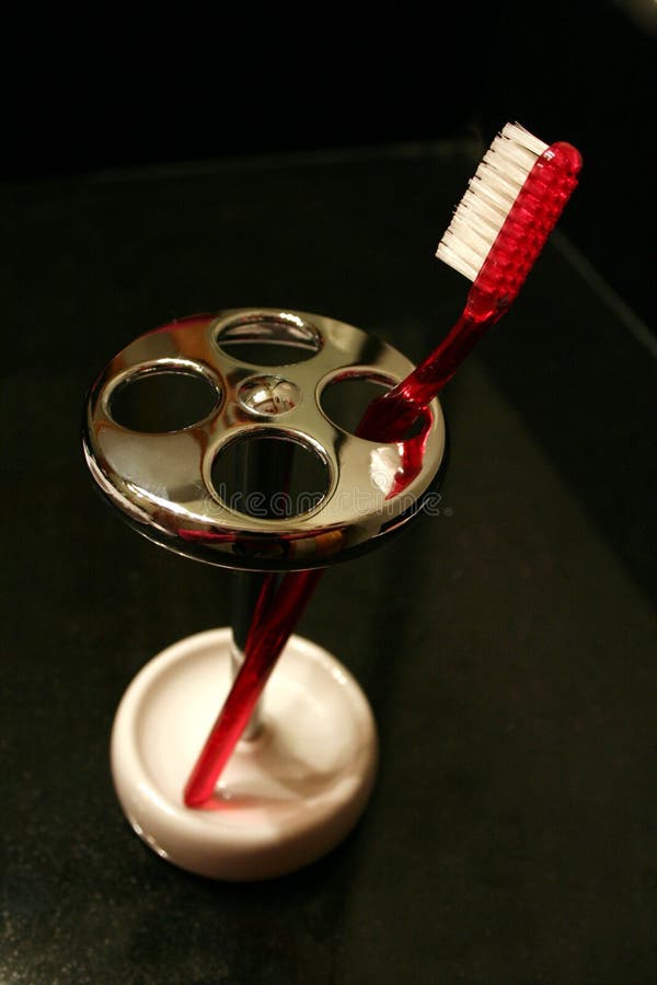 Red Toothbrush stock image. Image of black, teeth, holder - 4081519