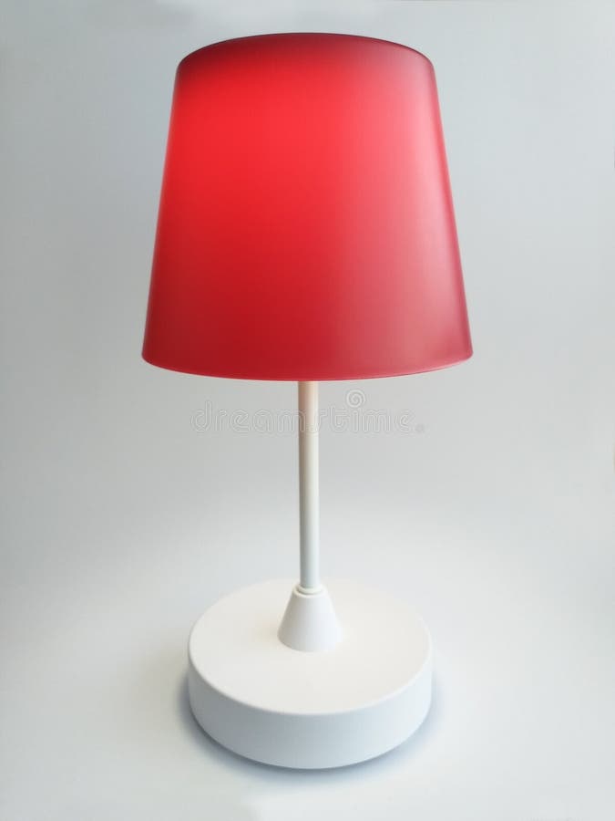 Red Touch Table Lamp Turned on with Warm Light Isolated on White ...