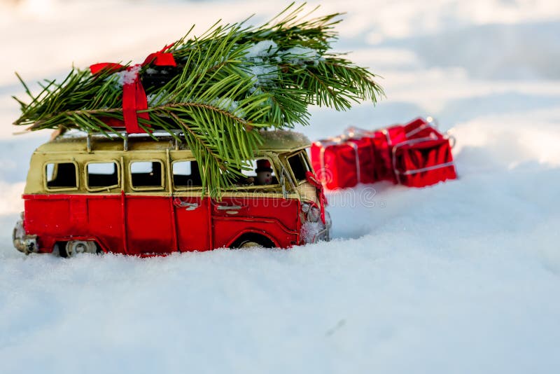 Red Toy Bus with a Christmas Tree on the Snow Stock Image - Image of ...