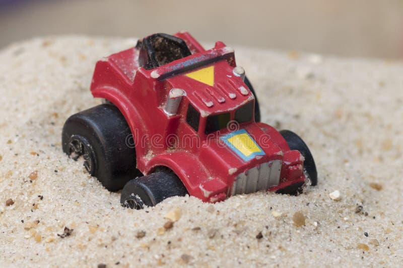Toy car on sand stock photo. Image of preschool, playschool - 99119648