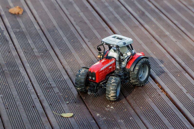Red toy tractor stock image. Image of beautiful, farmer - 132947035