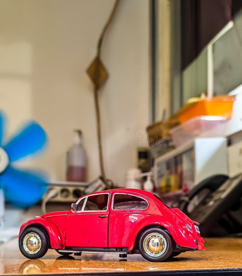 Red Toy VW Beetle stock photo. Image of vehicle, yellow - 254138572