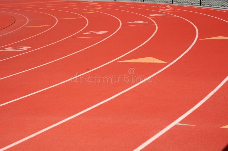 Red Track and Field lanes stock image. Image of compete - 51516367