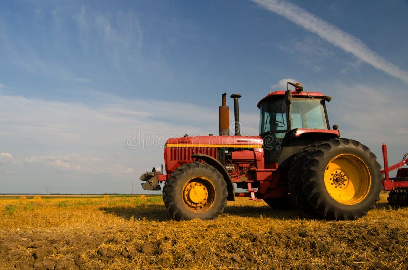 Red Tractor on the Agricultural Field Stock Image - Image of wheels ...