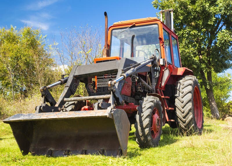 Red tractor closeup stock image. Image of closeup, machine - 56776985
