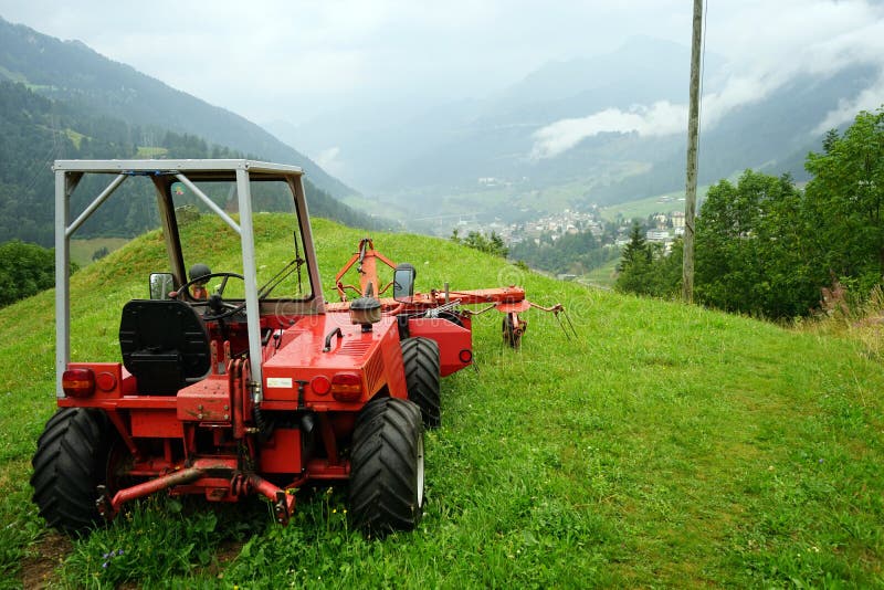 Red tractor stock photo. Image of agriculture, switzerland - 65362202