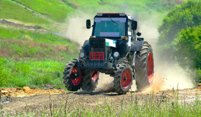 A Red Tractor Participates in the Race. Stock Photo - Image of ...