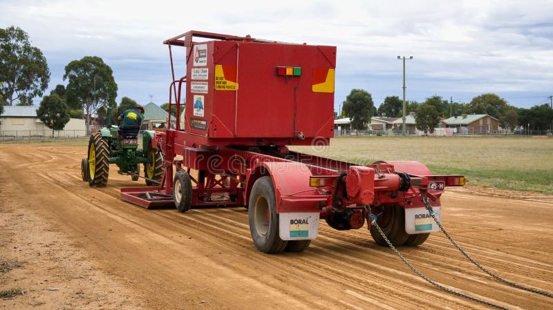 Red Tractor Pull Sled Being Pulled by a Green Tractor Editorial Image ...