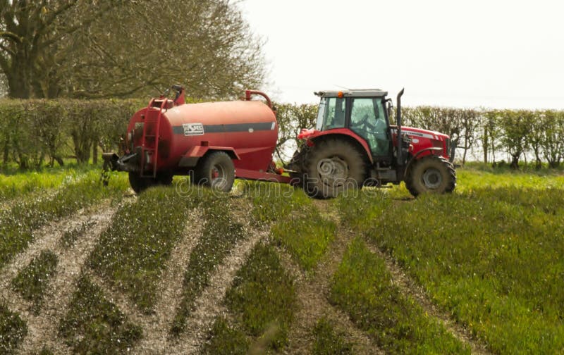 Red Tractor Spreading Spreading Slurry on Fields Editorial Stock Photo ...