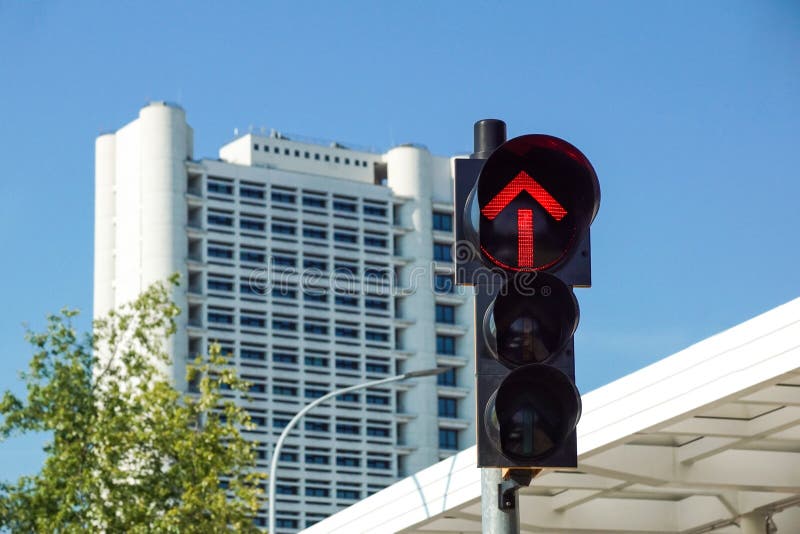 Red Traffic Light in the City Streets, with Red Arrow Traffic Light ...