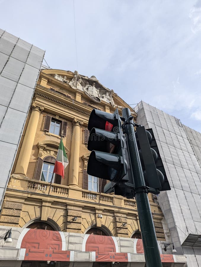 A Red Traffic Light in Front of a Building in Italy Stock Image - Image ...