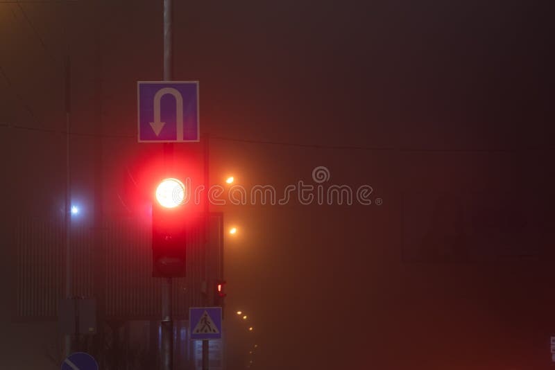 Red Traffic Light in Night City Fog Stock Photo - Image of urban, town ...