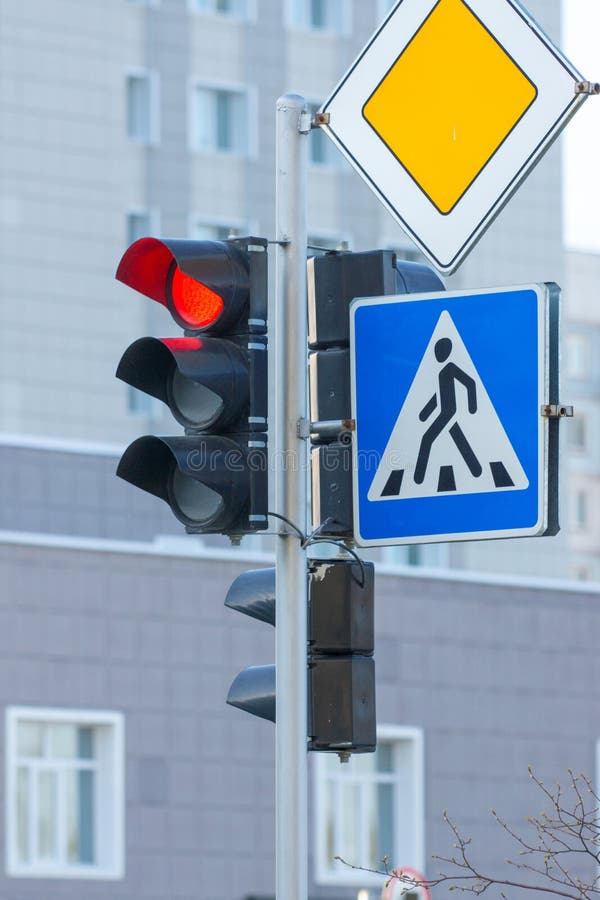 Red Traffic Light, Pedestrian Crosswalk and Main Road Signs Stock Photo ...