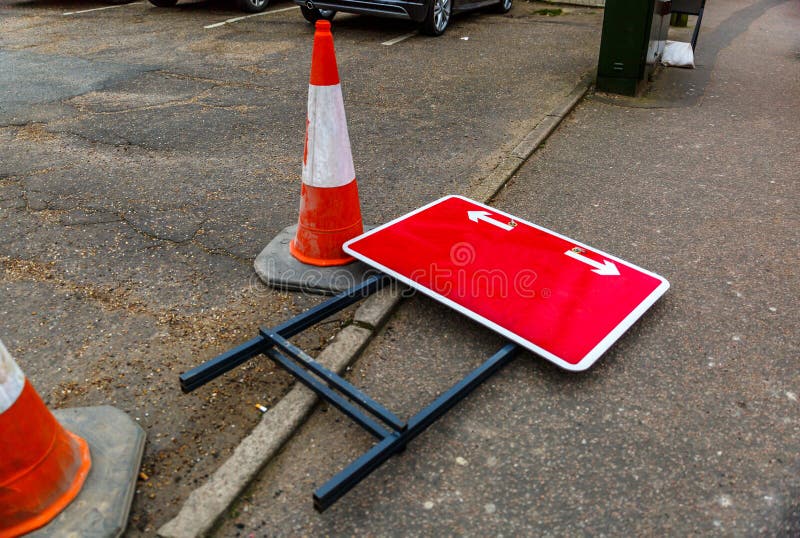 Red Traffic Sign, Lying in the Middle of a Cut Street Stock Image ...