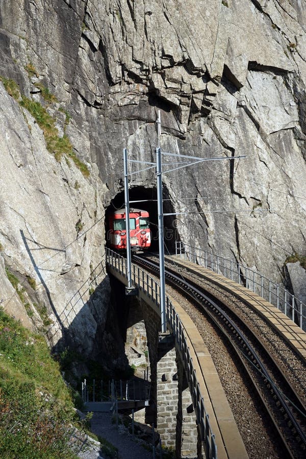 Red train editorial photo. Image of wire, mountain, mode - 65024961