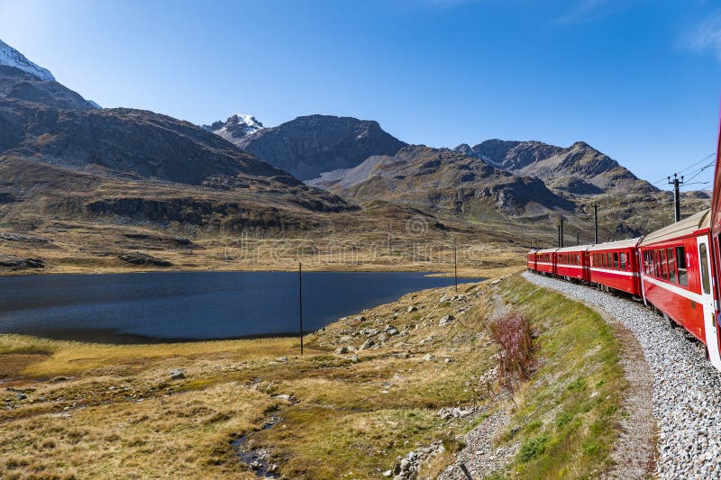 Red Train of Bernina in the Swiss Alps Stock Photo - Image of ...