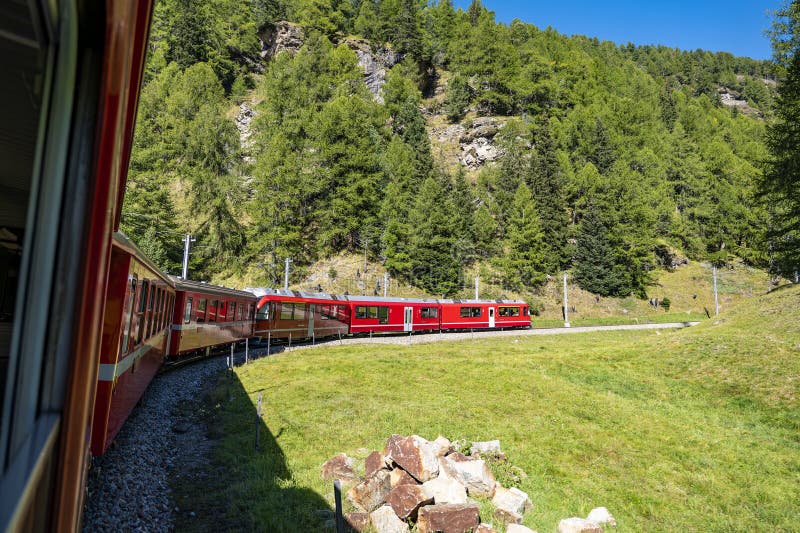 Red Train of Bernina in the Swiss Alps Stock Image - Image of scenic ...