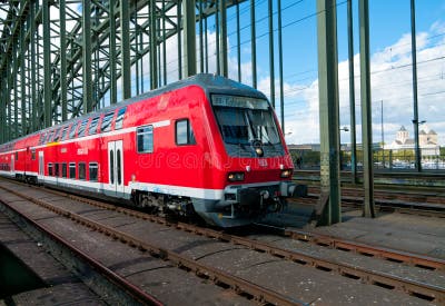 Red train on bridge editorial photo. Image of hohenzollern - 28841606