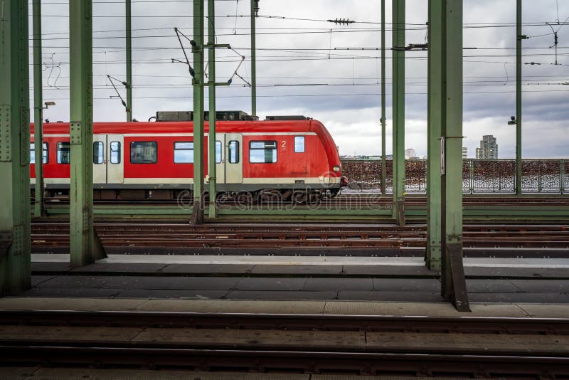 Red Train at Hohenzollern Bridge - Cologne, Germany Stock Image - Image ...
