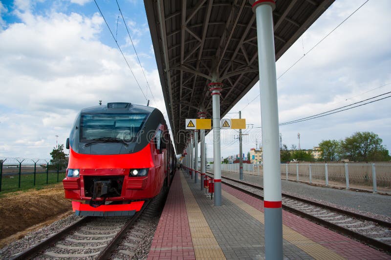 Red Train in Modern Railway Stock Photo - Image of journey, railway ...