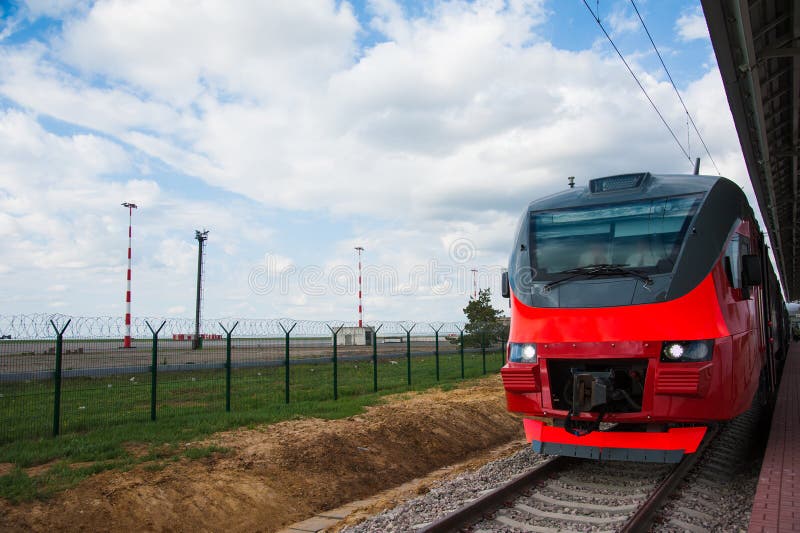 Red Train in Modern Railway Stock Photo - Image of industrial ...