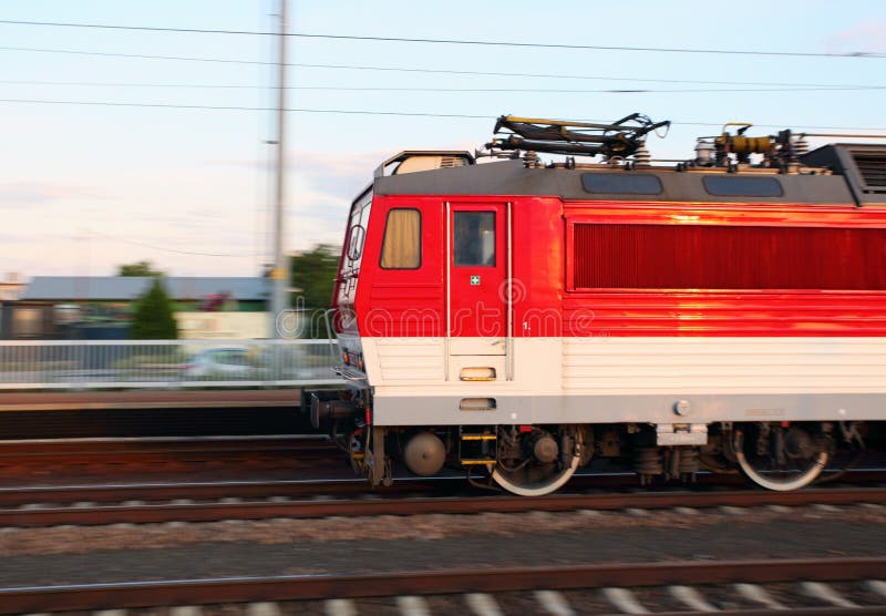 Red train in motion stock image. Image of locomotive - 20286511
