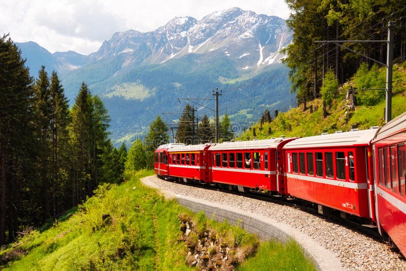 Red Train Moving in Beautiful Green Summer Forest in Switzerland Stock ...