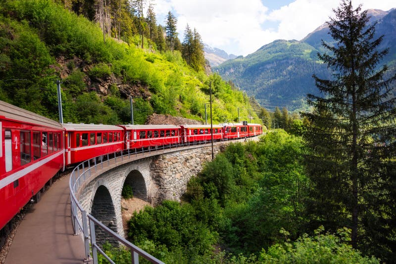 Red Train Moving in Beautiful Green Summer Forest in Switzerland Stock Photo - Image of mountain ...