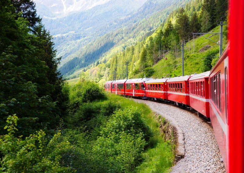 Red Train Moving in Beautiful Green Summer Forest in Switzerland Stock ...