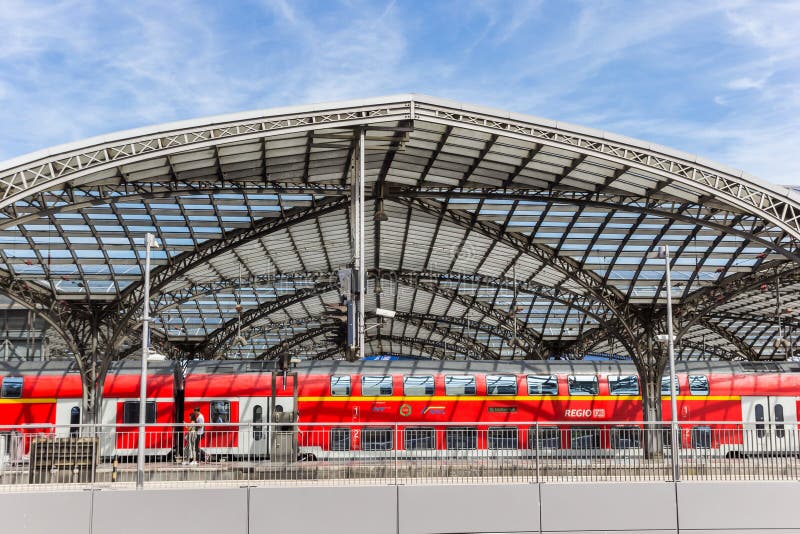 Red Train at the Platform of the Railway Station in Koln Editorial ...