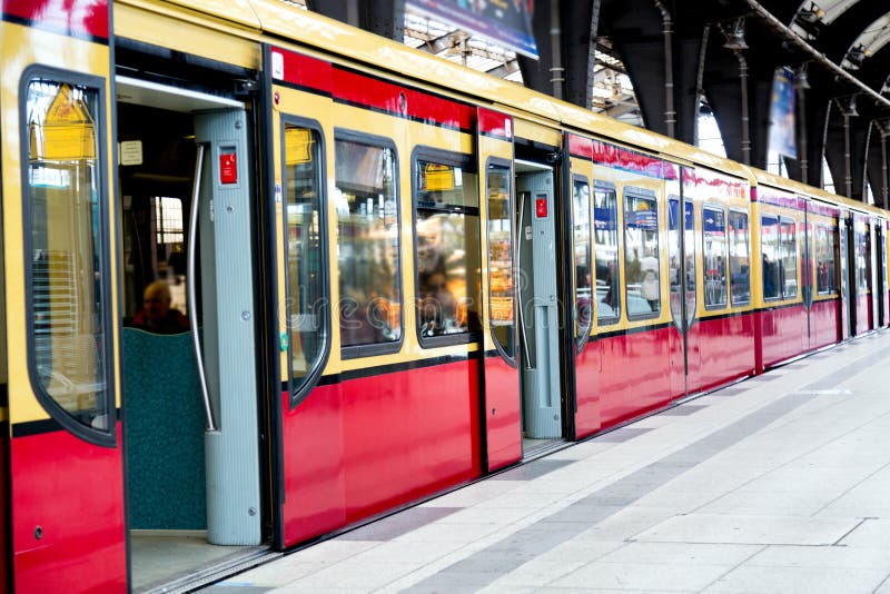 Red Train on Railroad Station with Opened Doors in Berlin, Germany ...