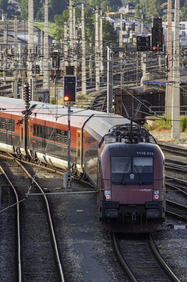 Red Train in a Railway Station Stock Photo - Image of locomotive ...