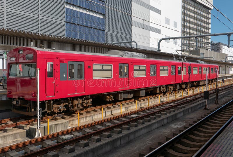Red train at a station stock photo. Image of track, outdoor - 133096238