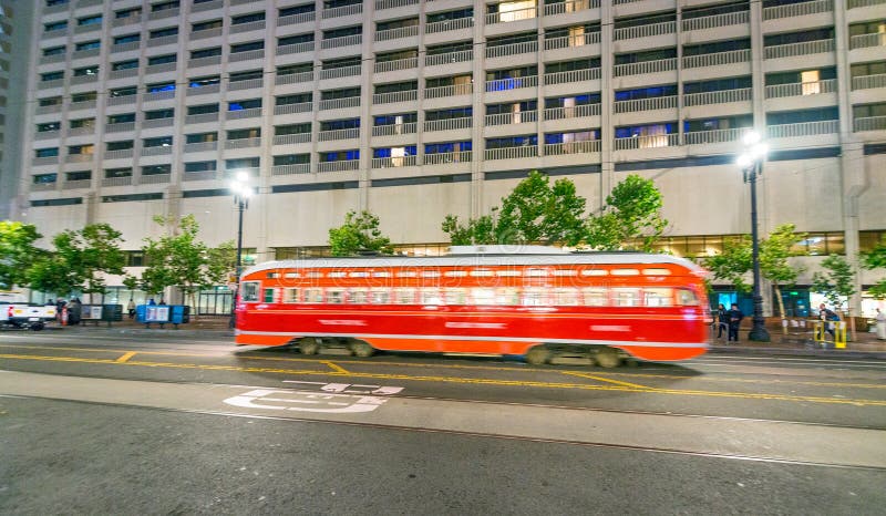 Red Tram Along City Streets at Night. Editorial Stock Image - Image of ...