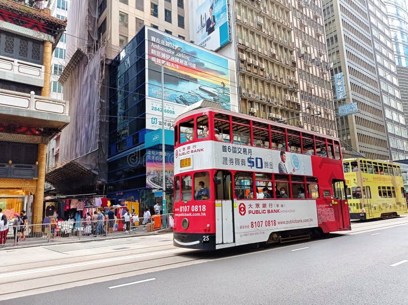 The Red Tram and Yellow Tram in Motion in Central Hong Kong Editorial ...