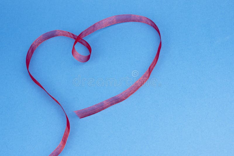 Red Translucent Ribbon in the Shape of a Heart Stock Photo - Image of ...
